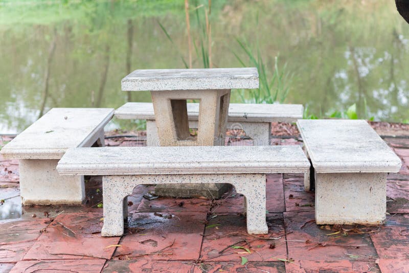 Outdoor Marble Table Set Near Pond Stock Photo - Image of pond ...