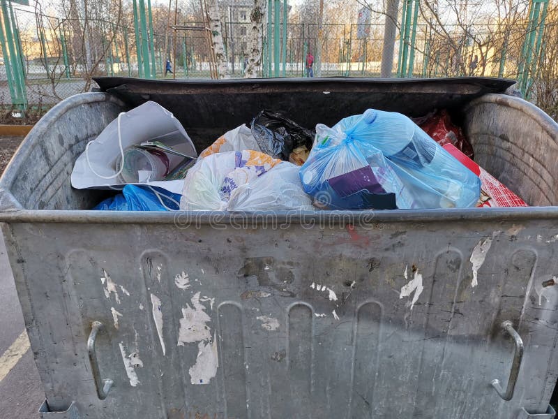 Overloaded Garbage Pavement In The Building With Door Can`t Clo Stock ...