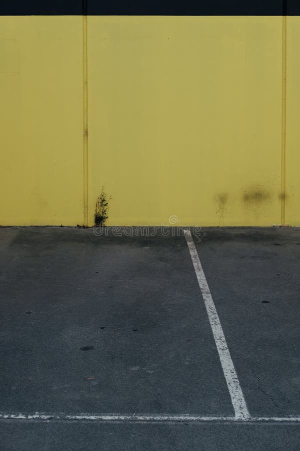 Outdoor Parking Lot with Yellow Walls Stock Image - Image of grunge ...