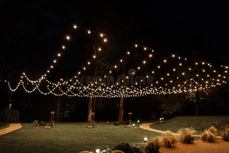 Outdoor Party Lights and Decorations Stock Image - Image of shining ...