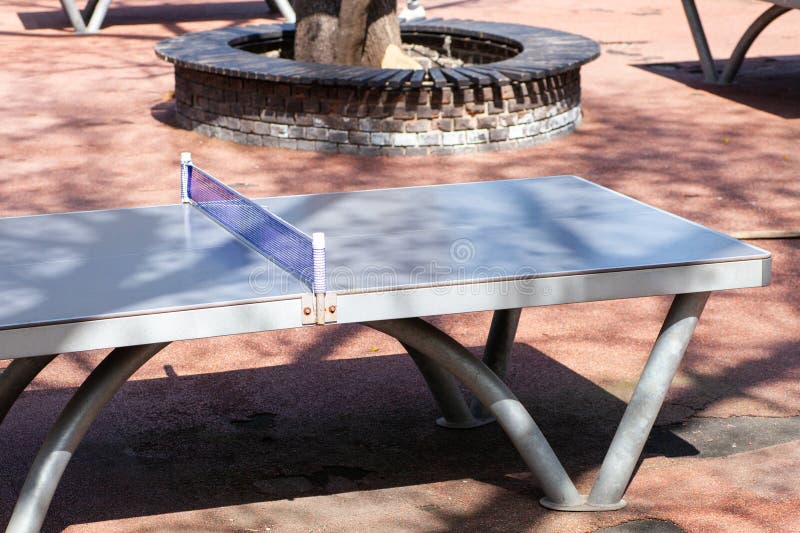 Outdoor Ping Pong Table in a Sunny Park Setting, Ready for a Game ...
