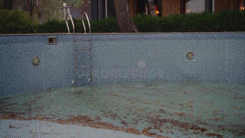 Outdoor Pool in a Country House without Water with Garbage at the ...