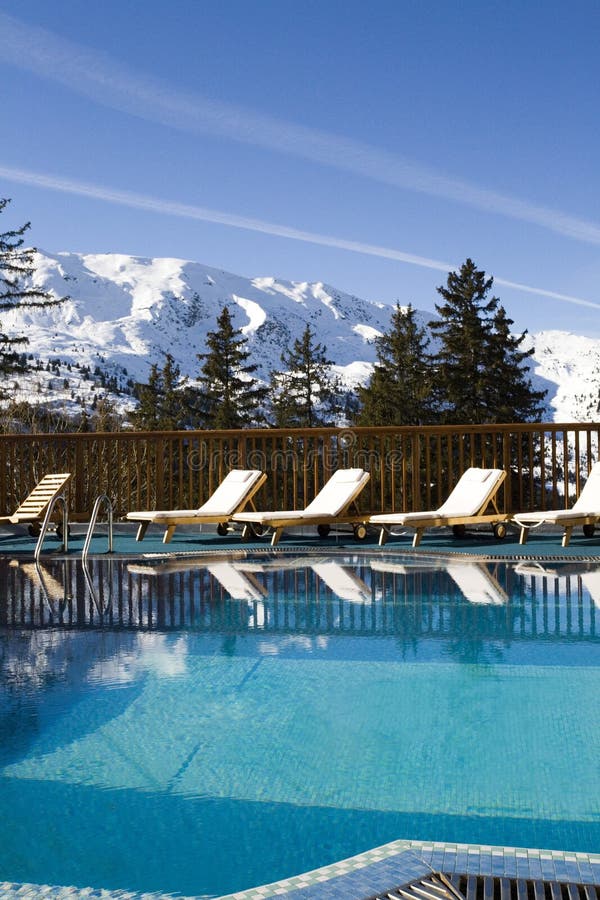 Outdoor pool in the snow stock photo. Image of mountains - 108323912