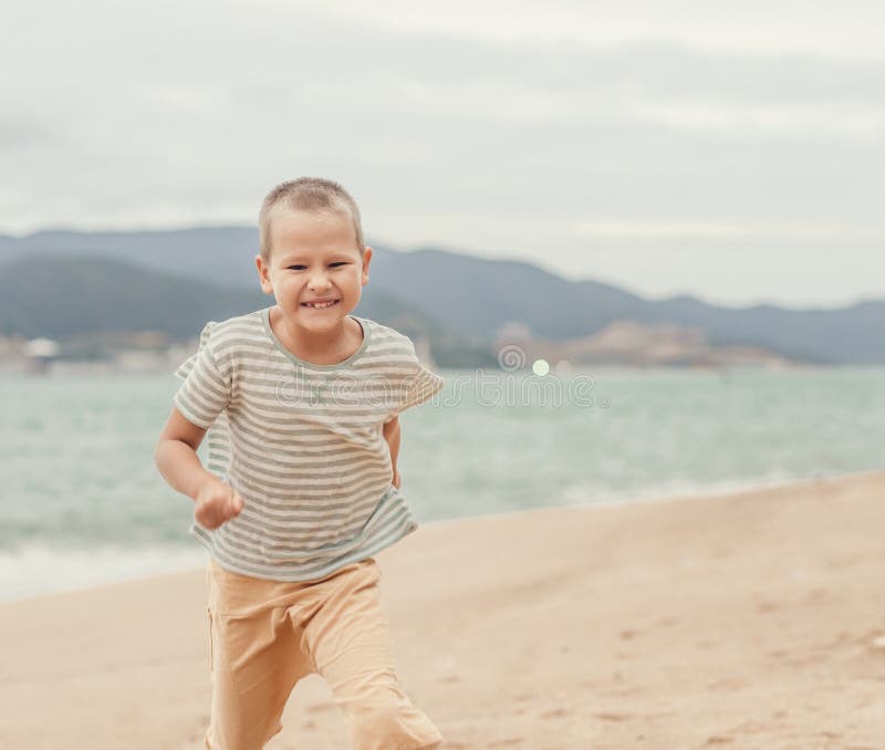 Outdoor Portrait of a Little Boy Running Stock Image - Image of clothes ...