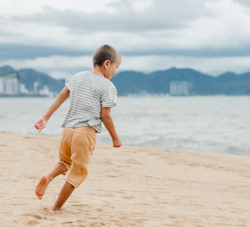 Outdoor Portrait of a Little Boy Running Stock Image - Image of active ...