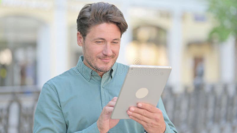 Outdoor Portrait of Man Using Tablet Outdoor Stock Image - Image of ...