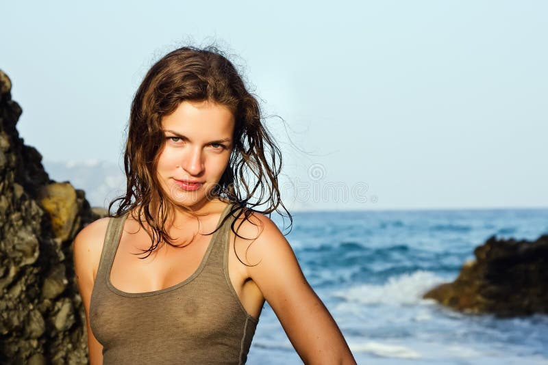 Woman Kneeling On Rocks In A Bikini Stock Image Image Of Smile