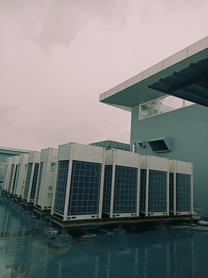 Outdoor rainy rooftop editorial photo. Image of skyscraper - 261638516