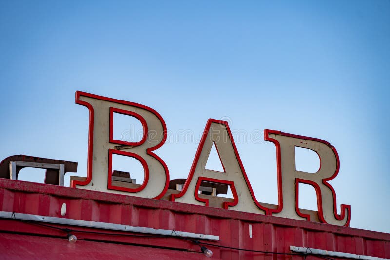 Outdoor Red and White Bar Sign Stock Image - Image of cafes, text ...