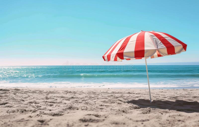 An Outdoor Red and White Striped Umbrella on a Beach Stock Image ...