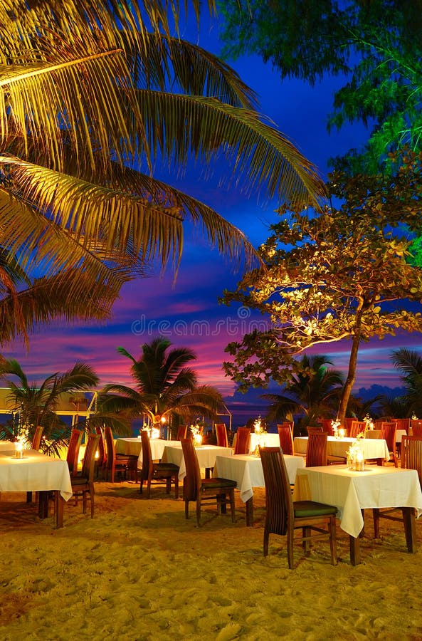Outdoor Restaurant at the Beach during Sunset Stock Image - Image of ...