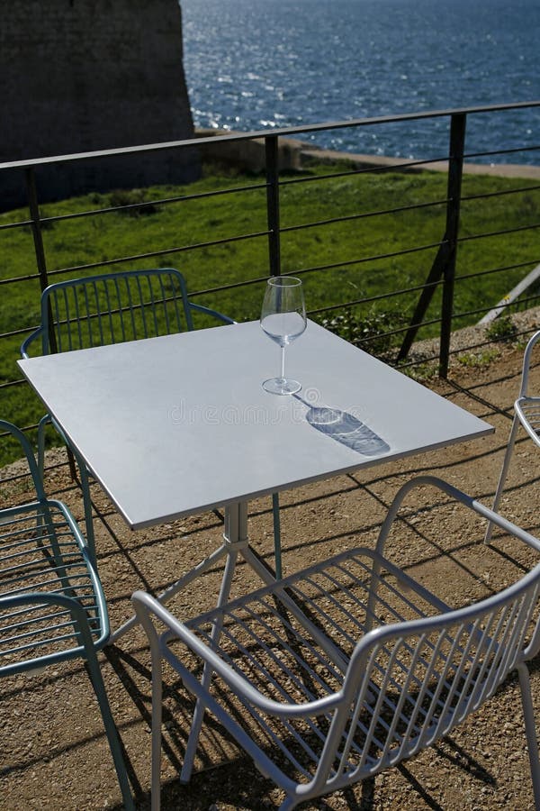 Outdoor Restaurant Table with Empty Wine Glass Stock Image - Image of ...