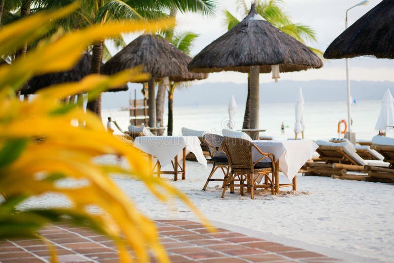 Outdoor Restaurant Tables on Perfect Sand Beach Stock Image - Image of ...