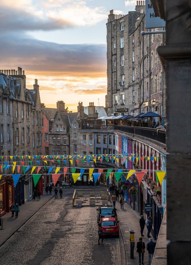 An Image of an Outside Setting with a Clock and Flags Editorial Stock ...