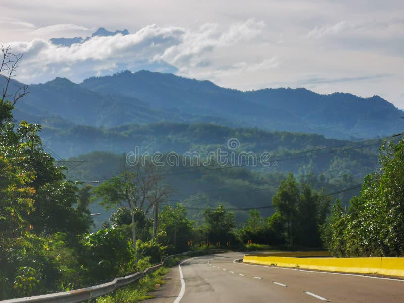 Outdoor Scenery during Day Time on the Road with Forest and Mountain ...