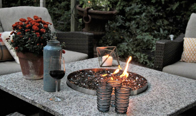 Soft Flannel Pillows and a Lit Fire Pit for Fall Stock Photo - Image of ...