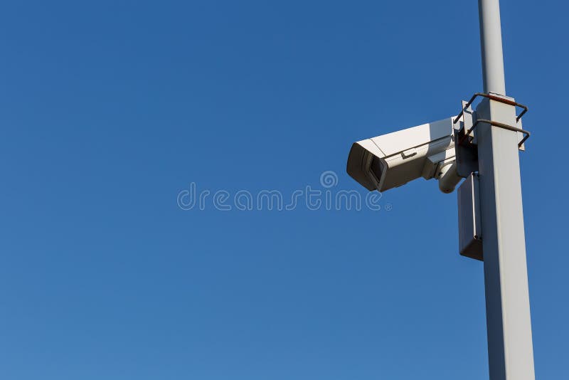 Outdoor Security Camera on Blue Sky Background. Stock Photo - Image of ...