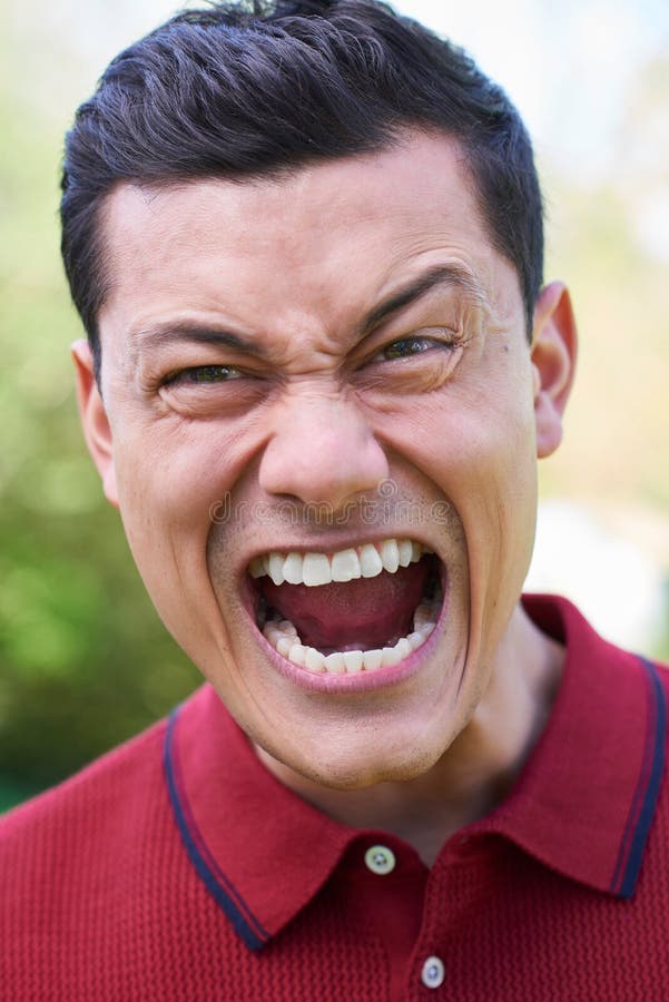 Outdoor Shot of Angry Young Man Shouting at Camera Stock Image - Image ...