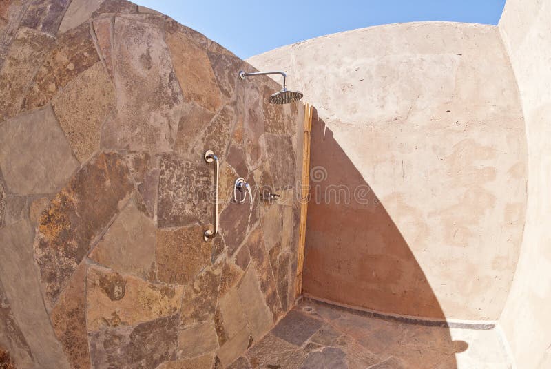 Outdoor Shower with Adobe Walls Stock Image - Image of sunny, outdoor ...