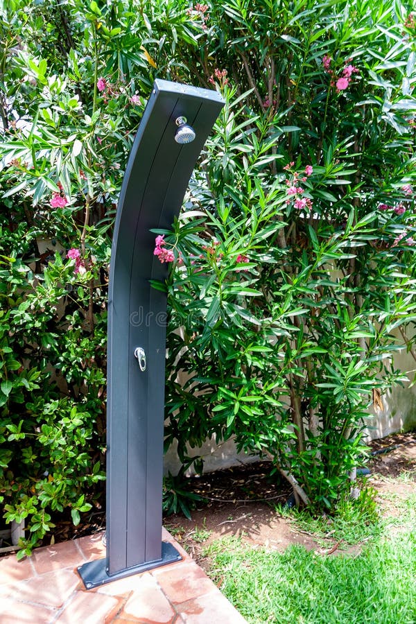 Outdoor shower head stock image. Image of sunny, patio - 305873859