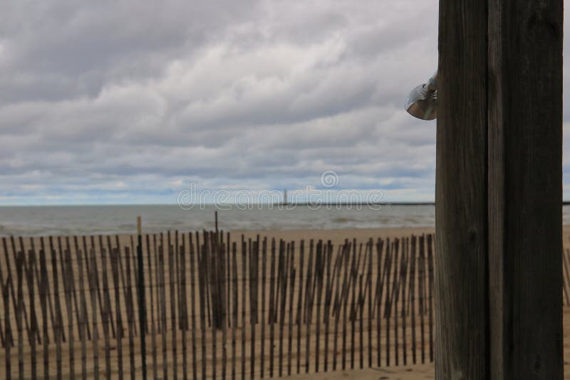Outdoor Shower Stands Alone before an Empty Beach Stock Photo - Image of waves, scenic: 351134036