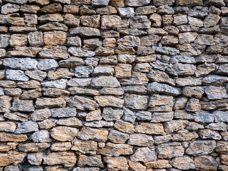 Outdoor Stone Wall Composed of Assorted Sizes of Rocks Stock Photo ...