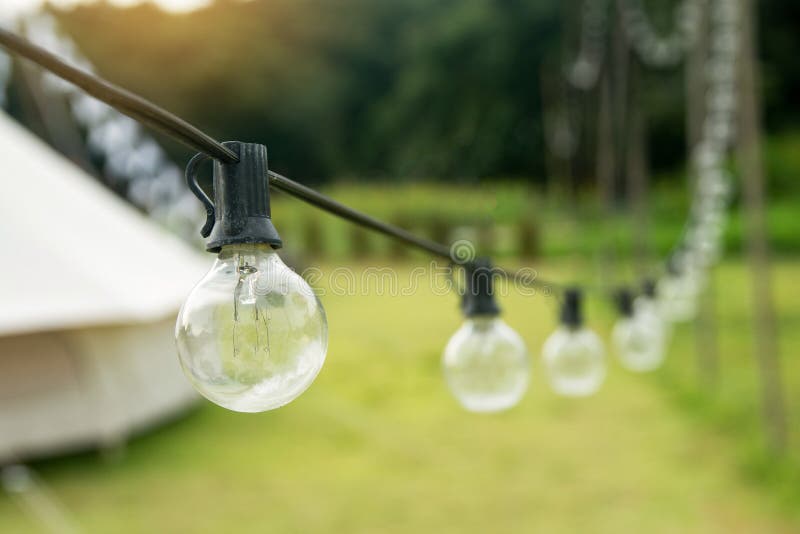 Outdoor String Light Bulbs Hanging on a Line Stock Image - Image of ...