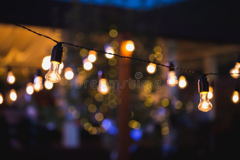 Outdoor String Lights Hanging on a Line in Backyard. Stock Image ...