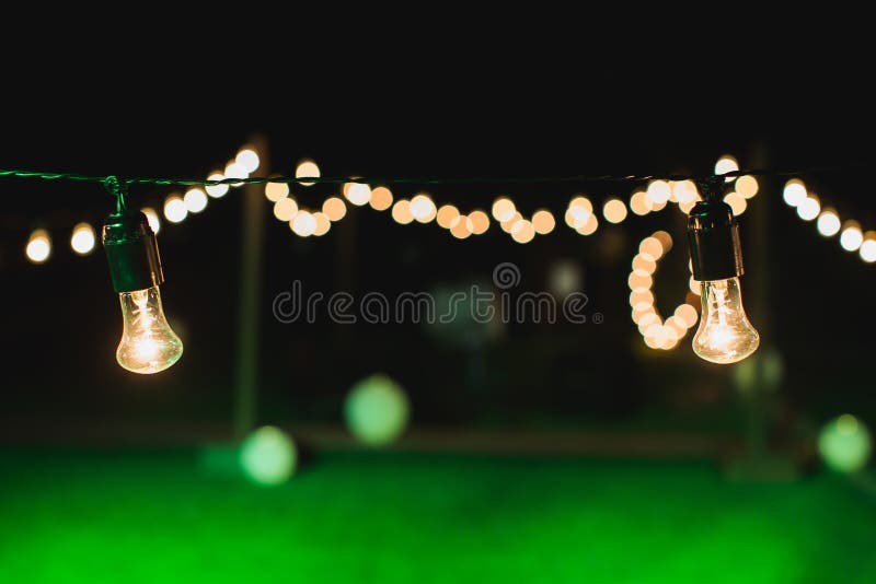 Outdoor String Lights Hanging on a Line in Backyard. Stock Image ...