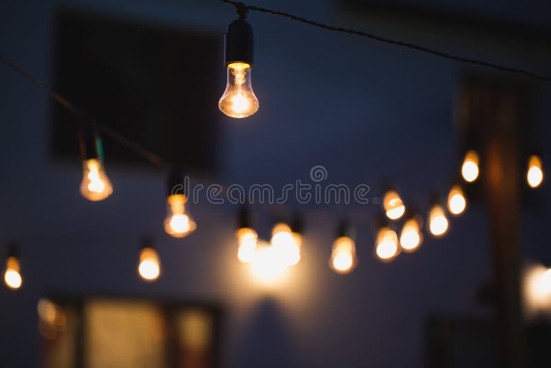 Outdoor String Lights Hanging on a Line in Backyard. Stock Photo ...