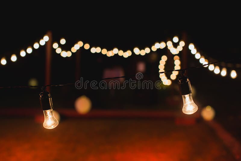 Outdoor String Lights Hanging on a Line in Backyard. Stock Image ...