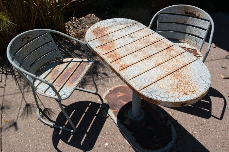 Outdoor Table and Chairs. Attractive Rust Patterns Stock Photo - Image ...