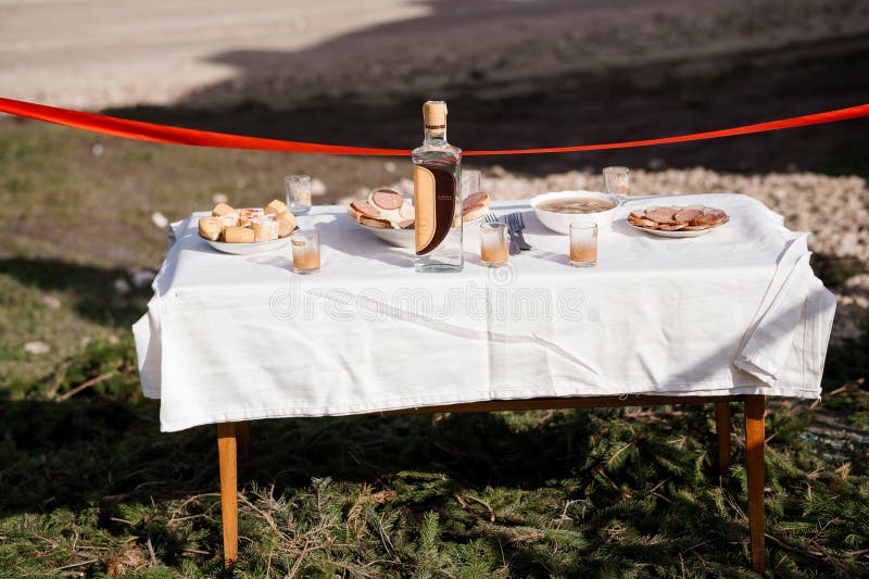 Outdoor Table Set for a Festive Gathering with Drinks and Snacks Stock ...