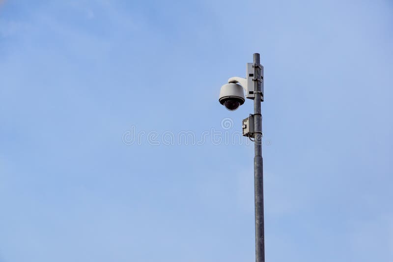 Surveillance Camera on Light Pole in Parking Lot Stock Image - Image of ...