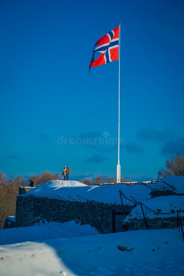 Outdoor View of Norwegian Flag with a Beautiful Blue Sky Stock Photo ...