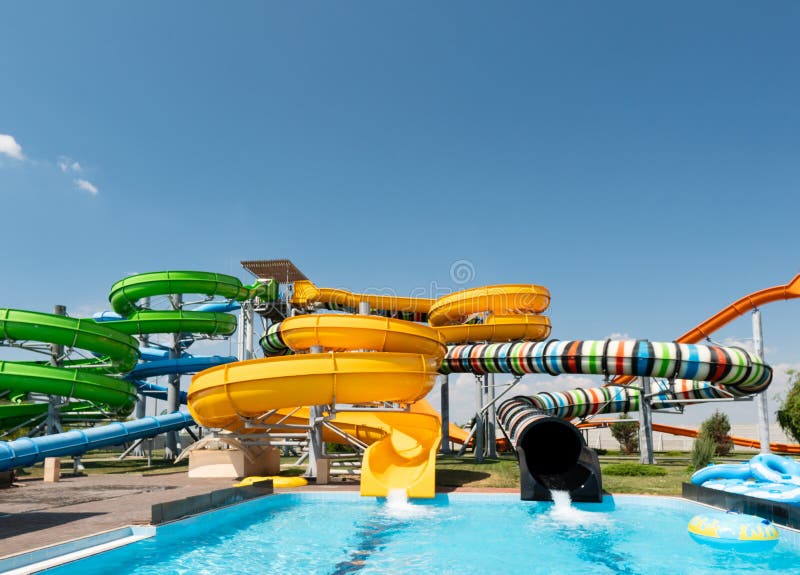 Water Park, Bright Multi-colored Slides with a Pool. a Water Park ...