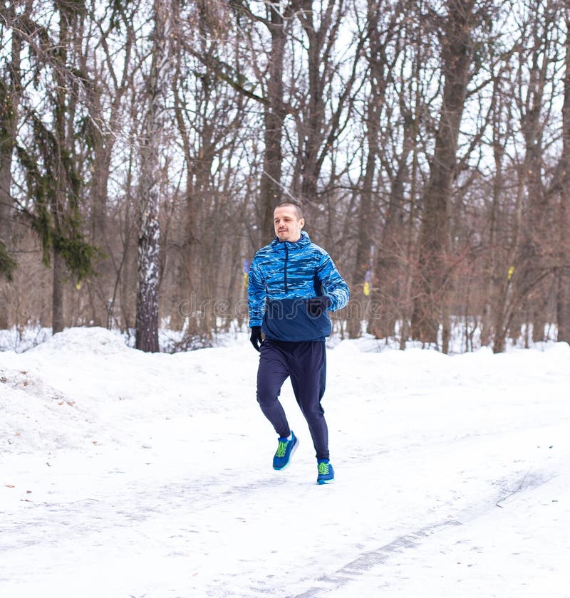 Outdoor Winter Running. Man Runner Do His Training Stock Image - Image ...