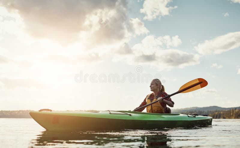 An Outdoors Activity with a Little Exercise Involved. a Young Woman ...
