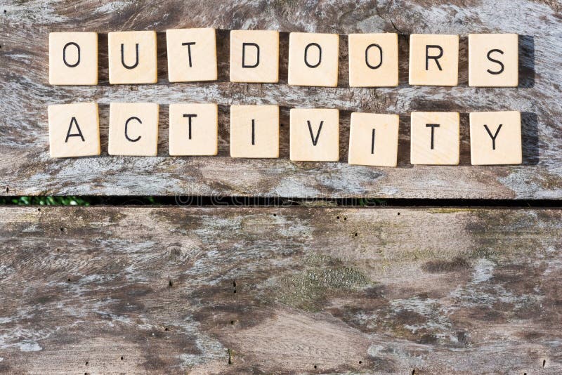 Outdoors Activity Words Letters on a Wood Table Stock Image - Image of ...