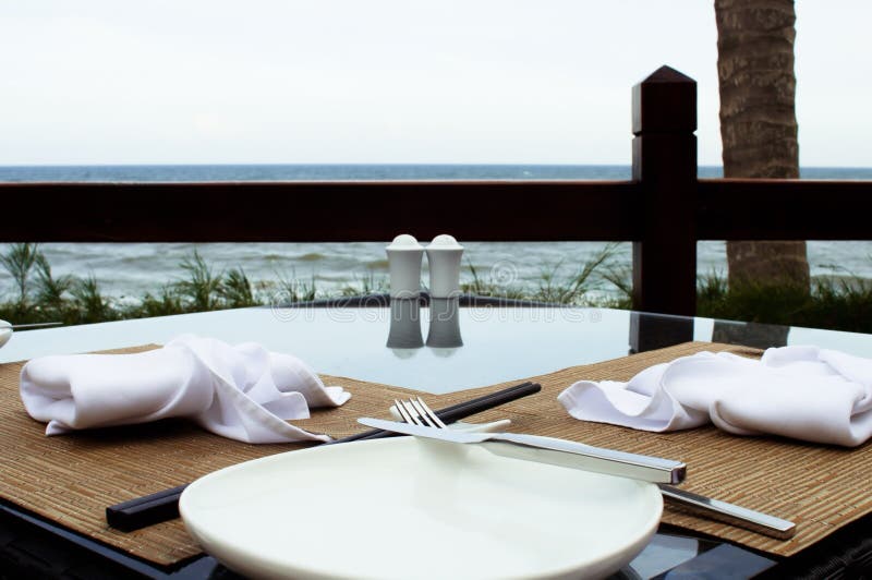 Outdoors Decorated Table with a Sea View Stock Photo - Image of ...