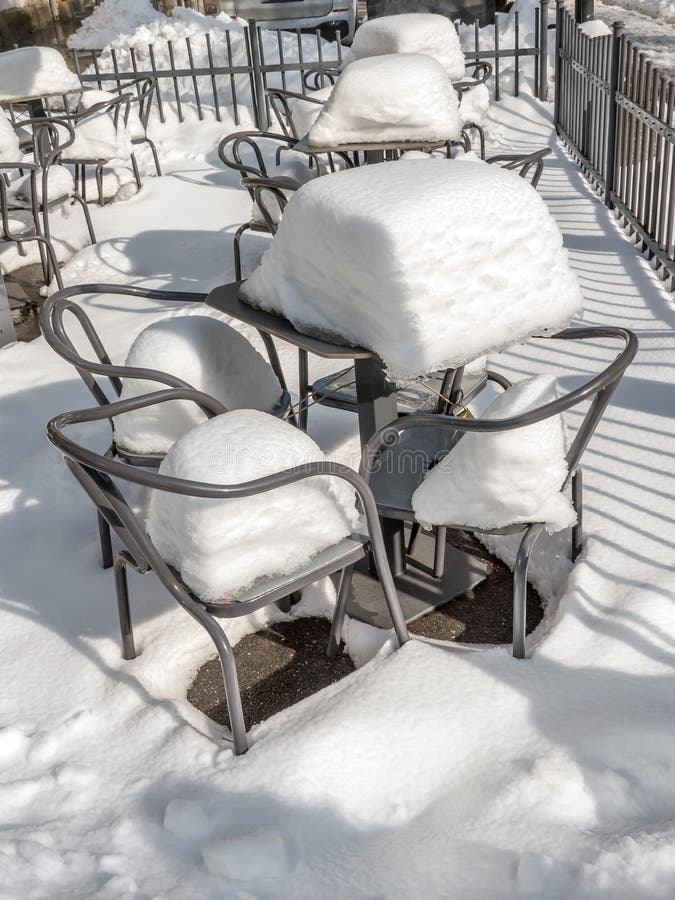Outdoors Restaurant Chairs and Tables Covered with Thick Snow Cover ...
