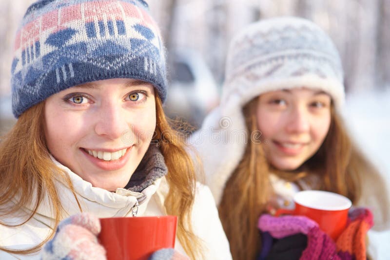 Outdoors on a Winter Day. Girls Drink Tea. Stock Photo - Image of ...