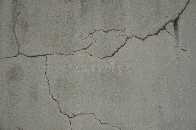 The Outer Wall of the Building. Beautiful Cracks in the Plaster Stock ...