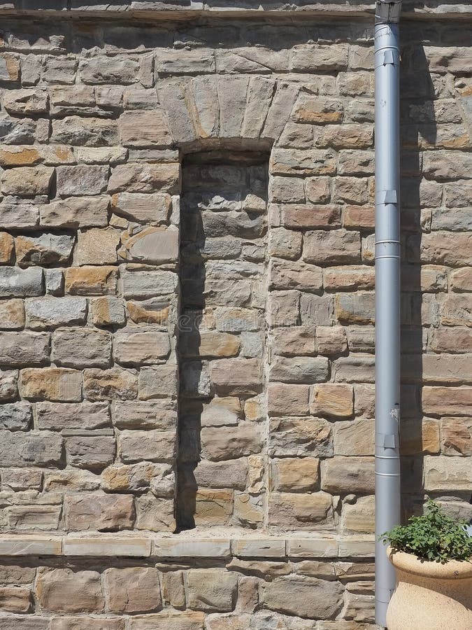 The Outer Wall of a Building with Rough Masonry and a Decorative Recess ...