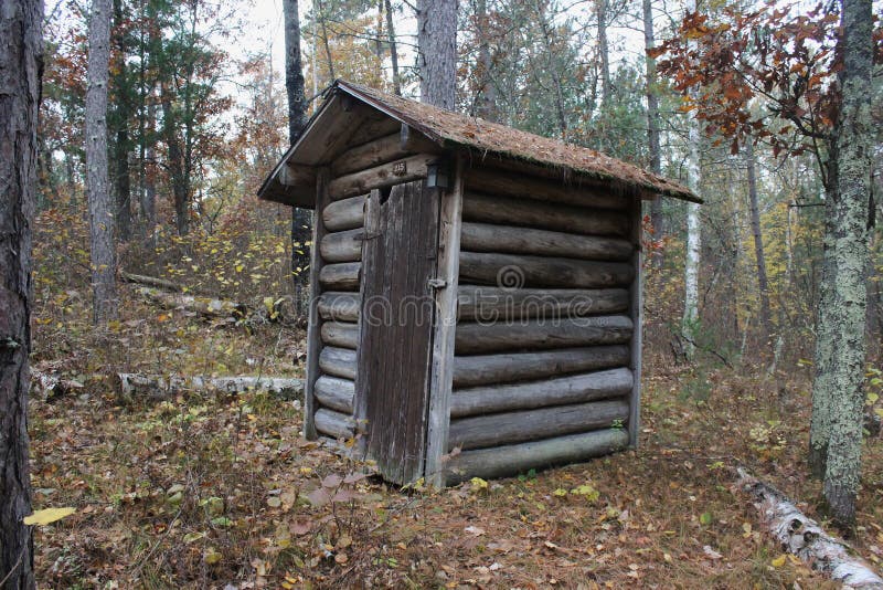Outhouse made of Logs stock photo. Image of brown, leaves - 79645676