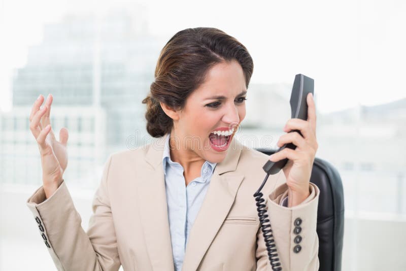 Outraged Businesswoman Shouting at Phone Stock Image - Image of ...