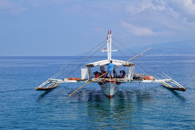 Outrigger Boat Anchored In Shallows Of Mangroves Stock Photo - Image of ...