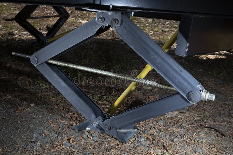 Outrigger Deployed on a Camper Trailer Stock Photo - Image of steel ...