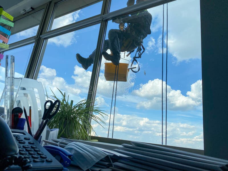 A Window Washing the Windows of an Office Stock Image - Image of ...