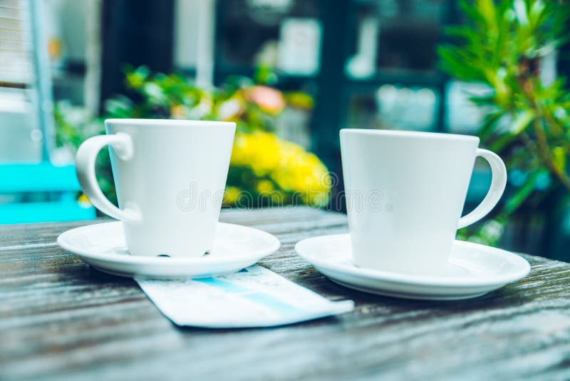 Outside Cafe Table with Two Cups on it Stock Image - Image of design ...